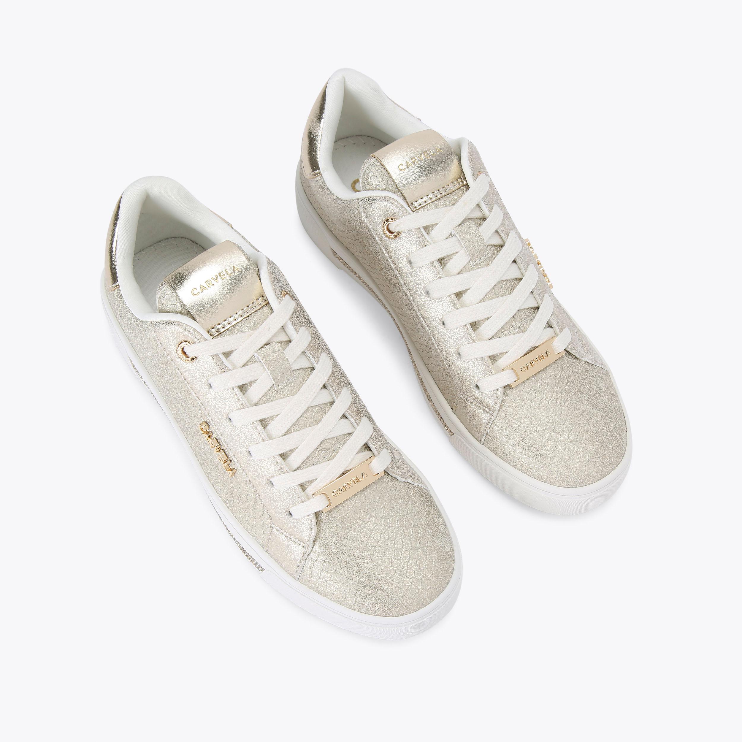 DIAMOND Gold Snake Print Trainer by CARVELA