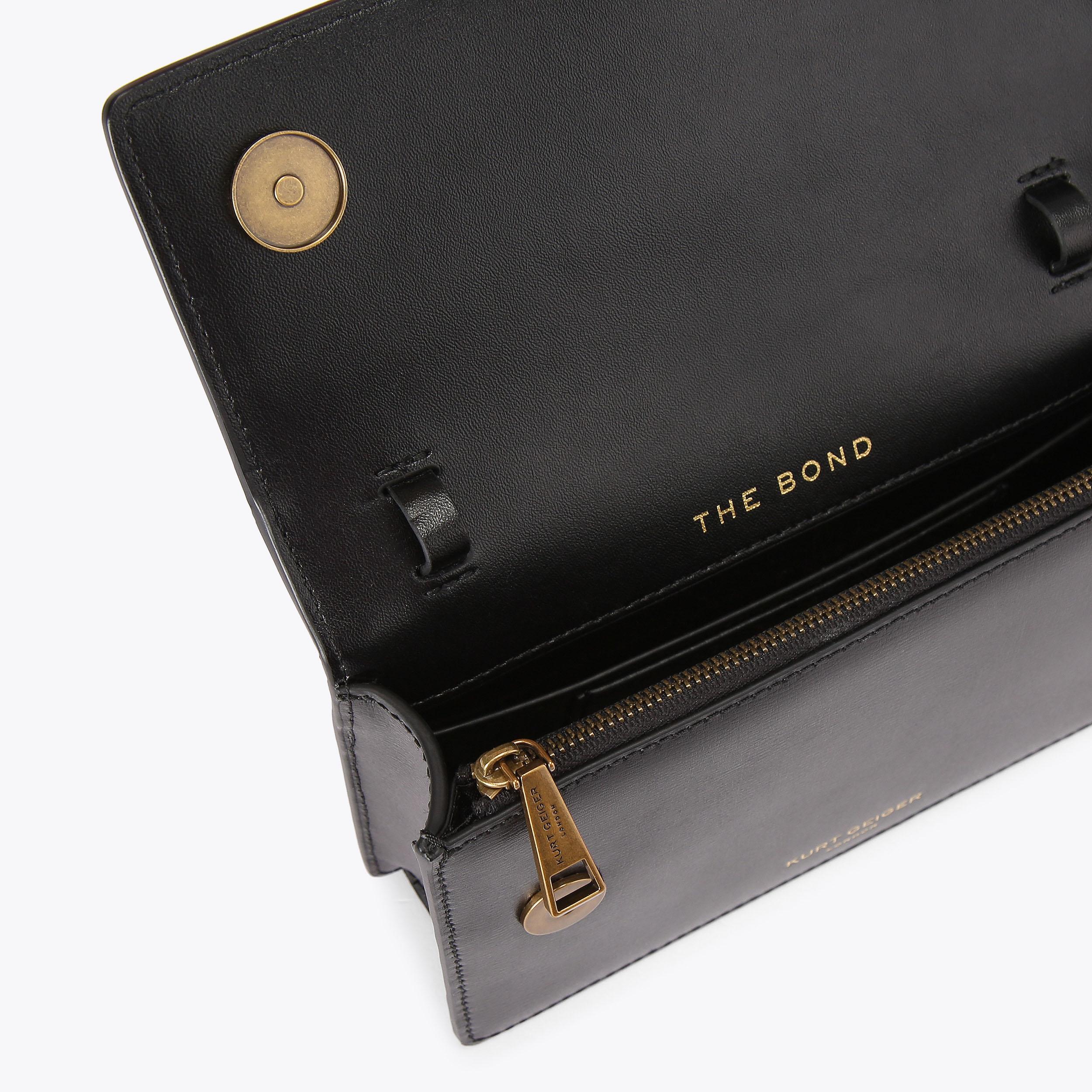 SM BOND TOP HANDLE BAG Black Top Handle Bag by KURT GEIGER LONDON