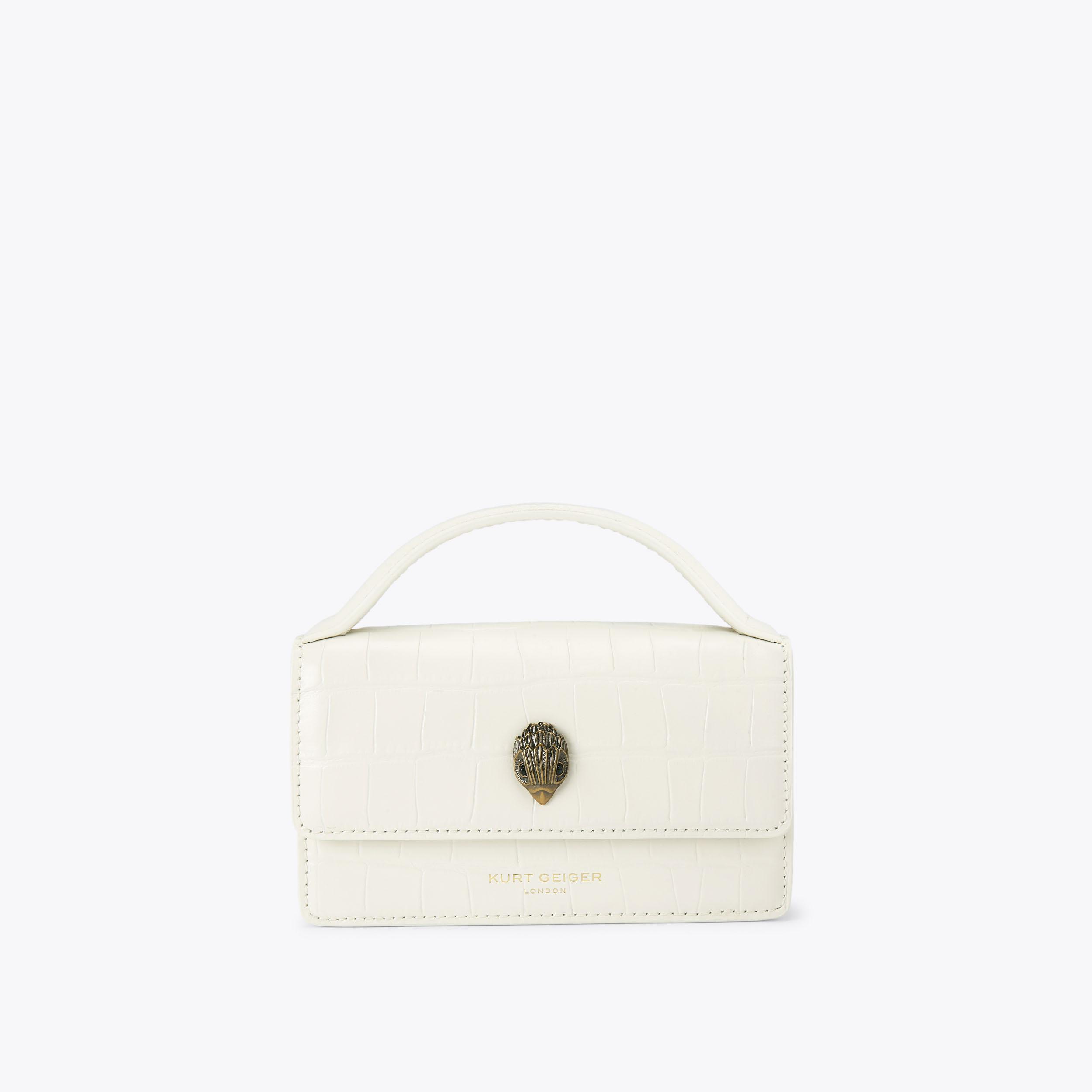 XS BOND TOP HANDLE BAG White Top Handle Bag by KURT GEIGER LONDON