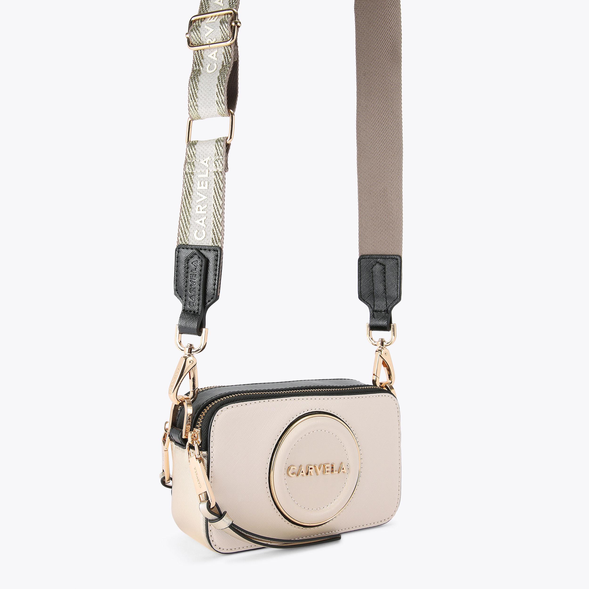 MINI ROMA CIRCLE Bone Camera Bag by CARVELA