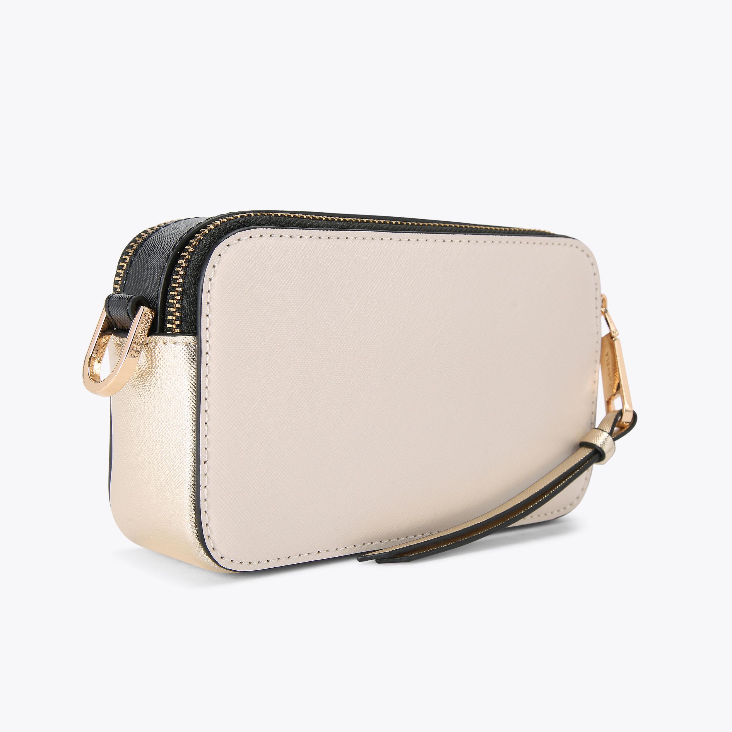 MINI ROMA CIRCLE Bone Camera Bag by CARVELA