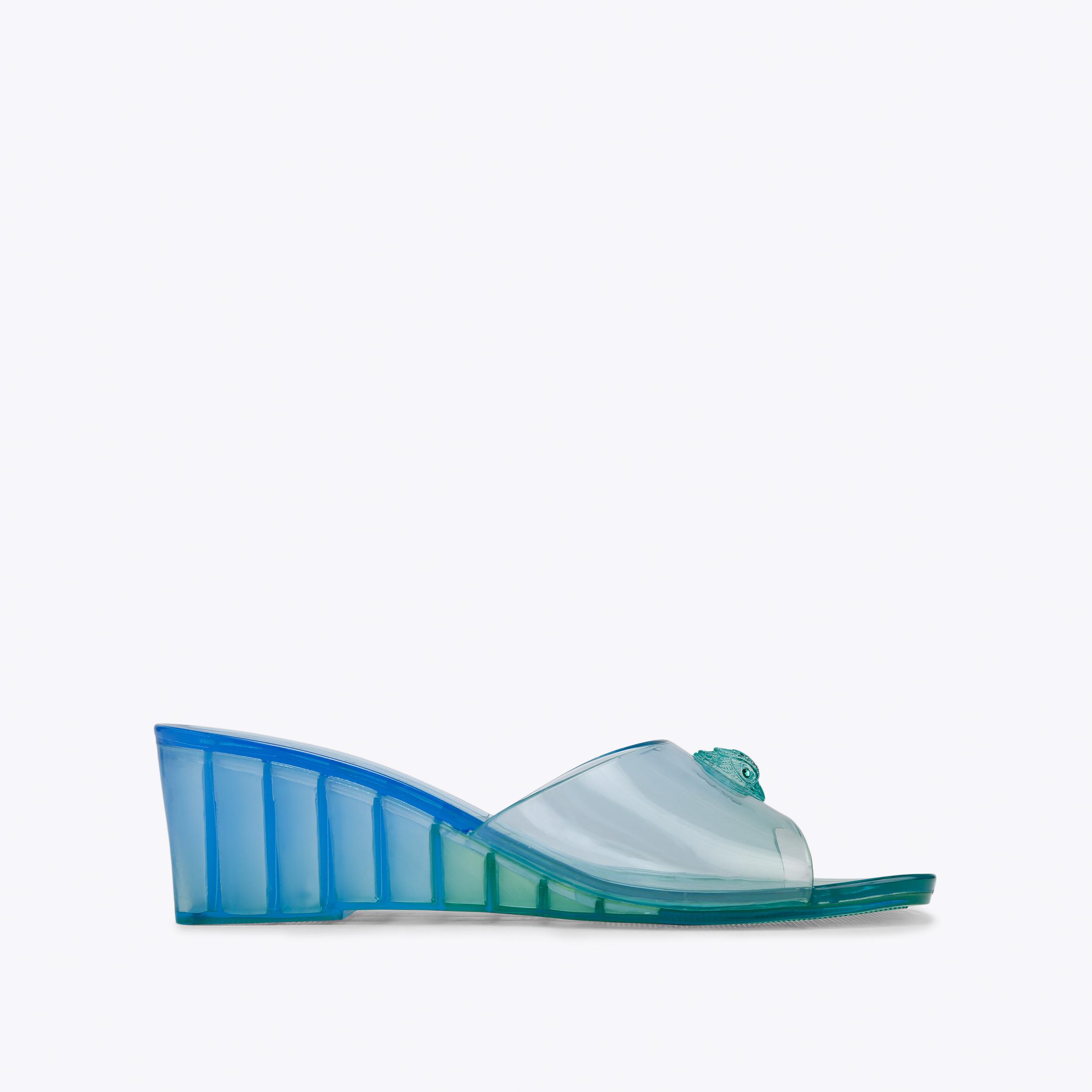 MADDISON WEDGE MULE Blue Perspex Wedge Mule by Kurt Geiger London