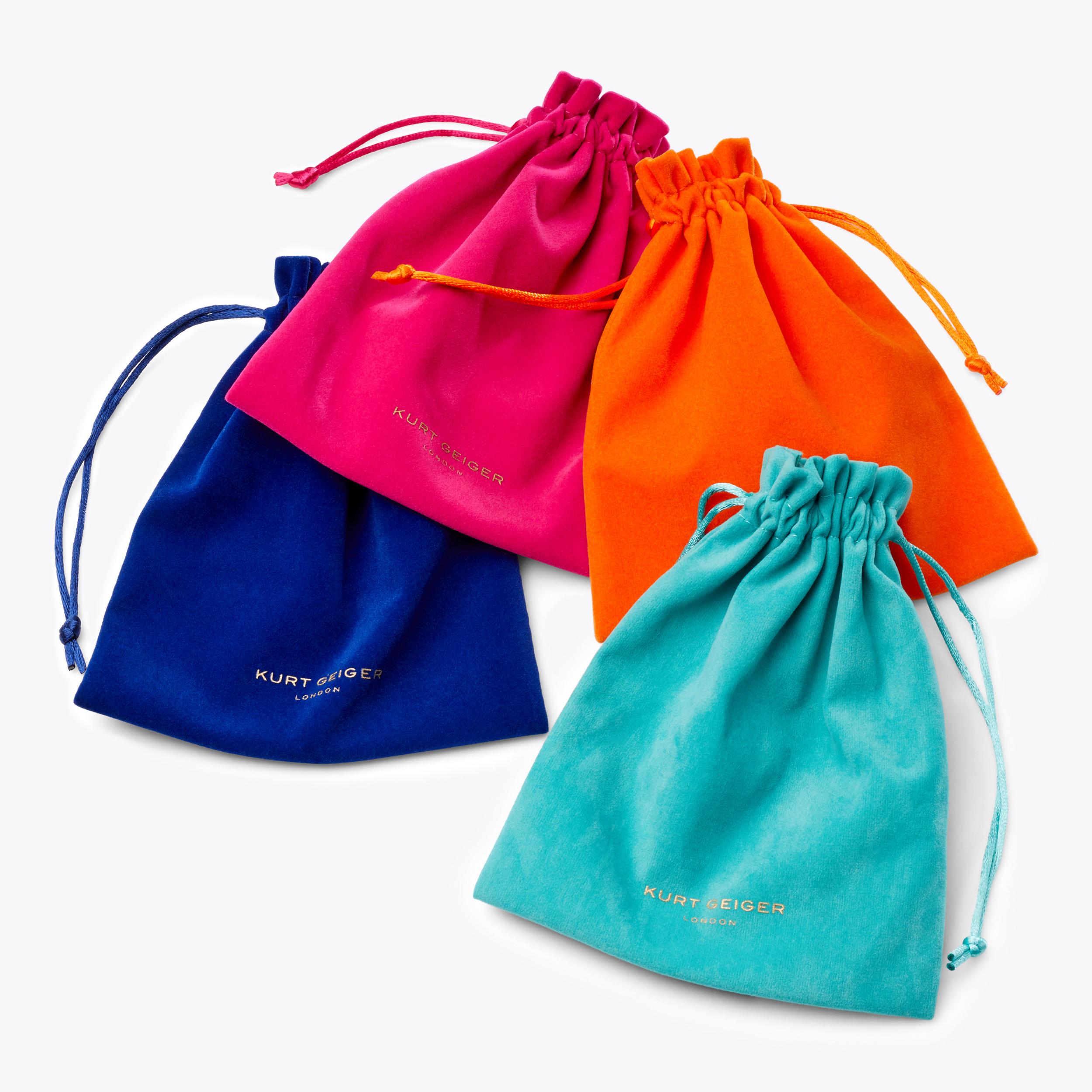 EVIL EYE CRYSTAL BRACELET Gold Eye Charm Bracelet by KURT GEIGER LONDON