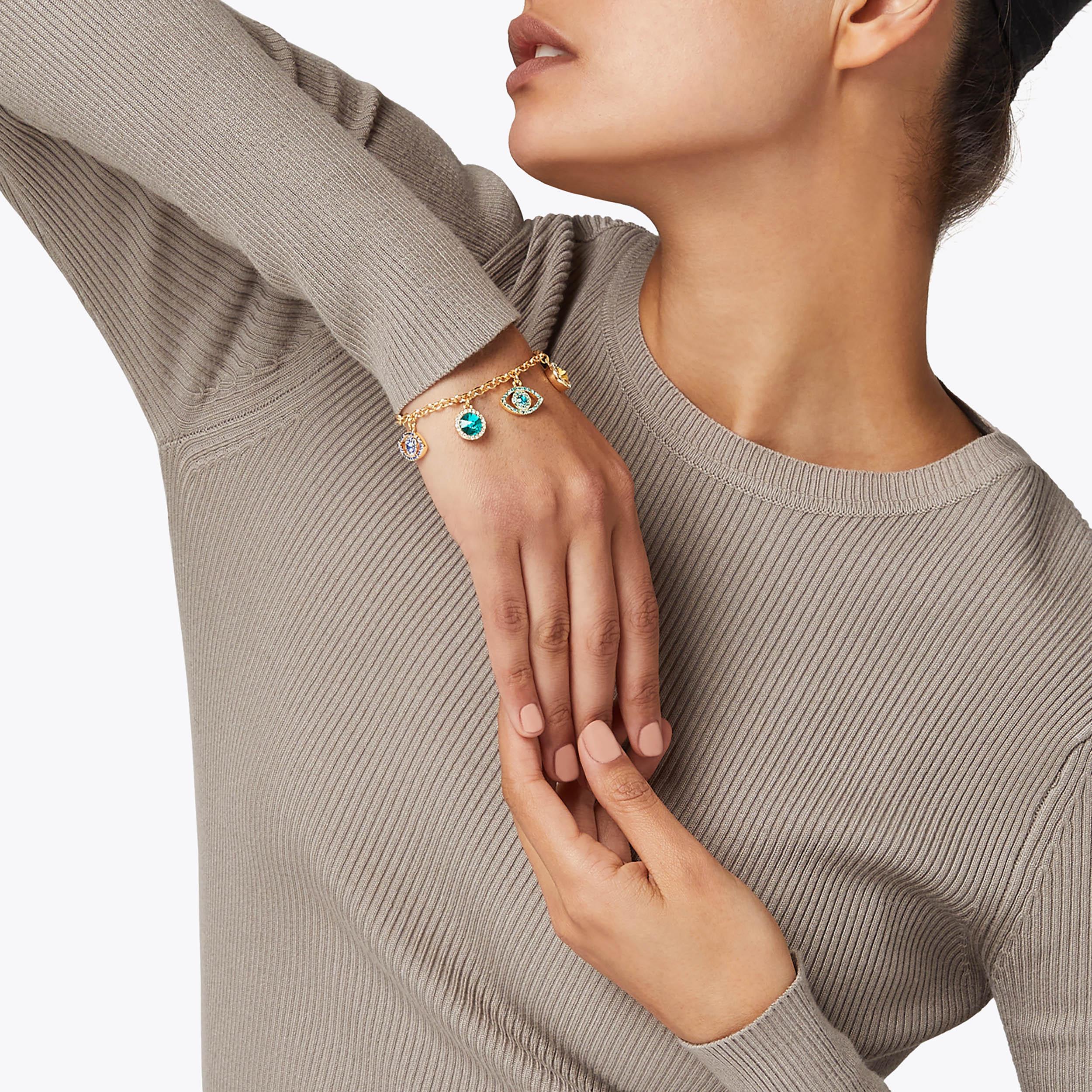 EVIL EYE CRYSTAL BRACELET Gold Eye Charm Bracelet by KURT GEIGER LONDON