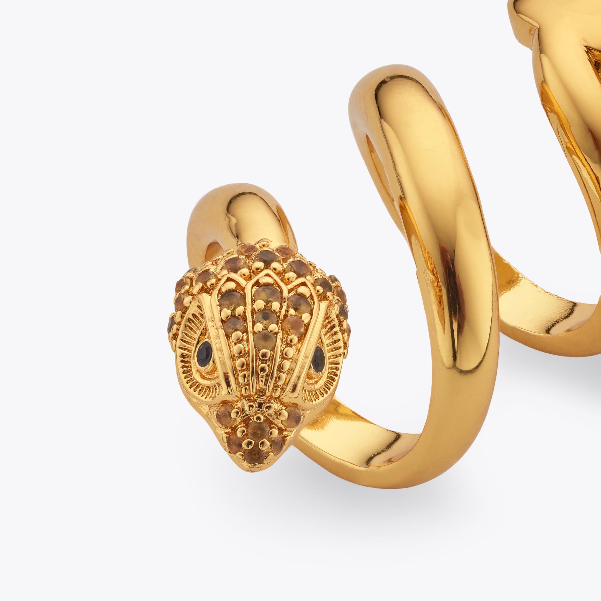 EAGLE SPIRAL RING Gold Spiral Nail Ring by KURT GEIGER LONDON